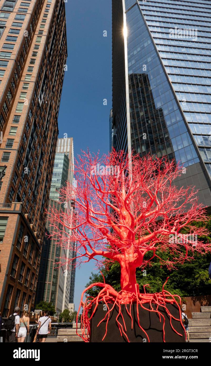 The old tree is a pink and red 25 foot tall sculpture comprised of man ...