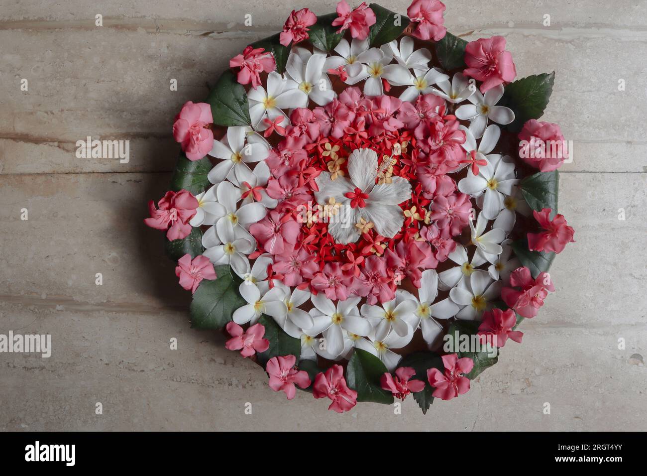 Beautiful flower rangoli also used as aarti thali decorated on pooja ...
