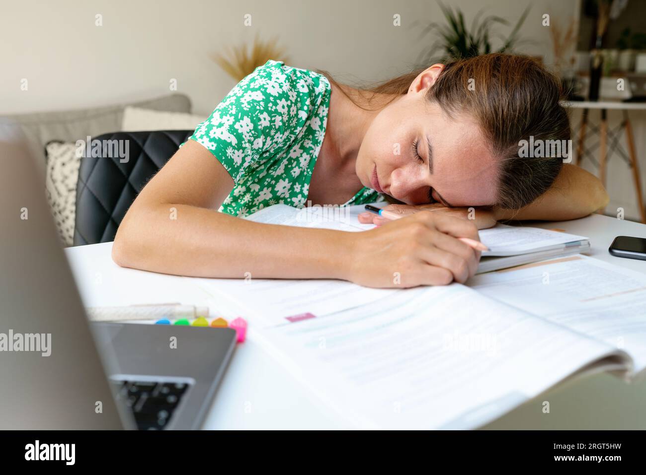 Tired overworked woman university student sleeping at the desk Stock ...