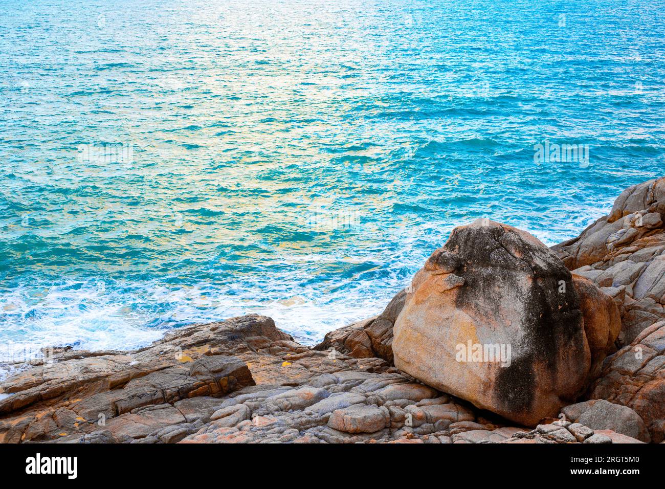 Beautiful Seascape. blue sea and rocky shore at sunset. Travel and ...