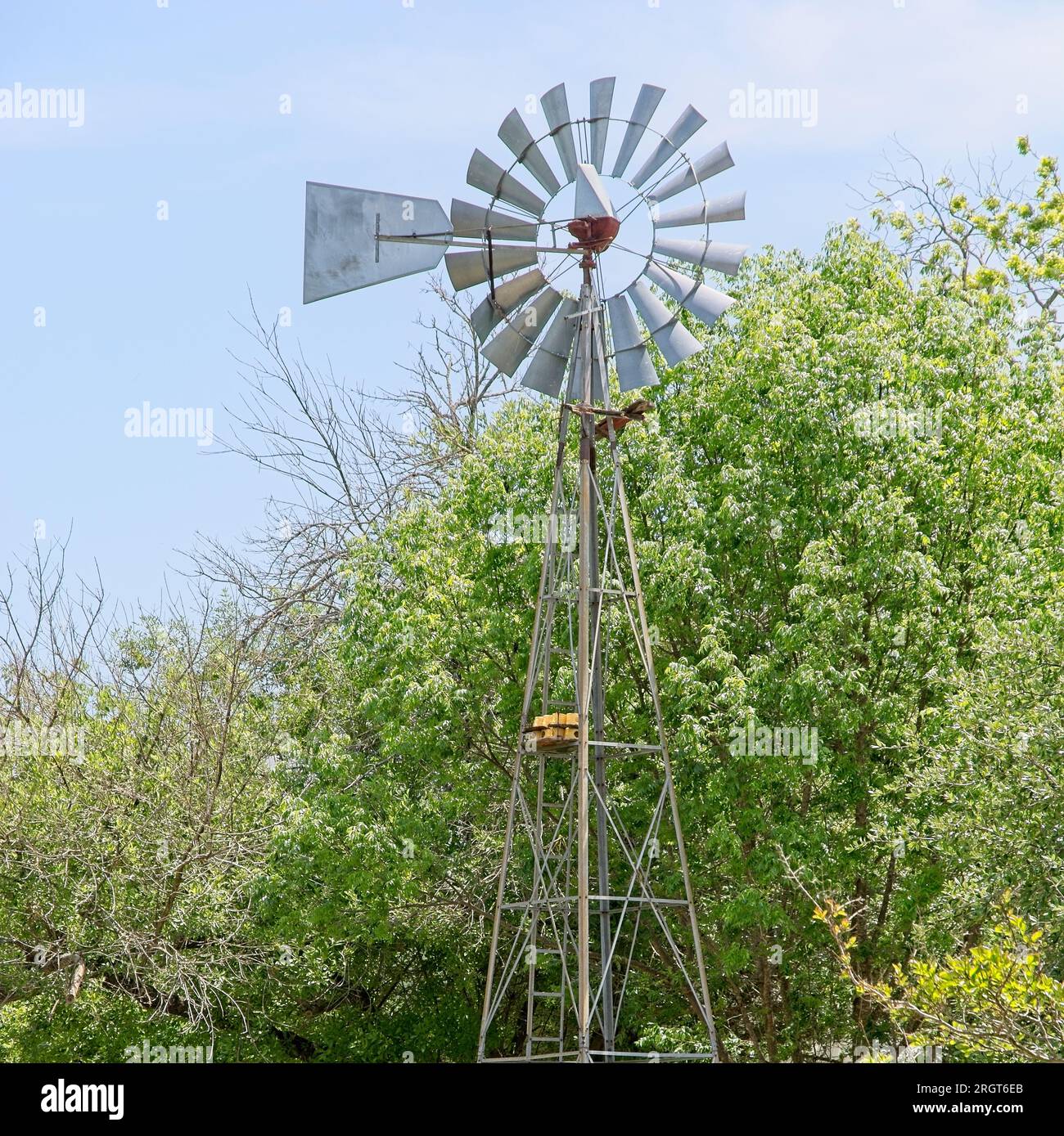 Windmill on steel truss tower Stock Photo - Alamy