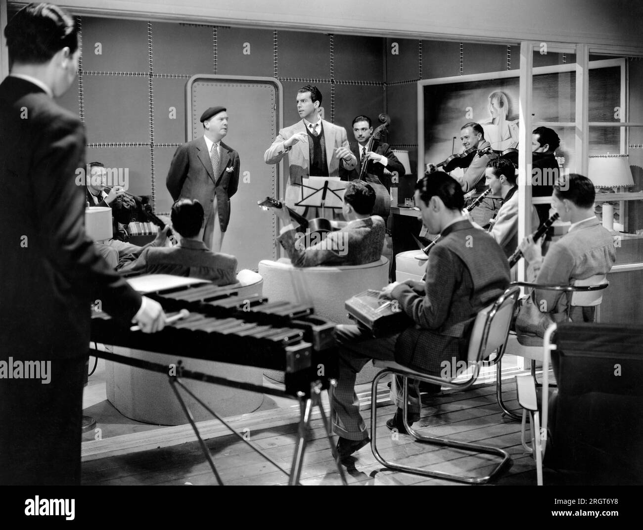 Fred MacMurray (center), on-set of the Film, "The Princess Comes Across ...