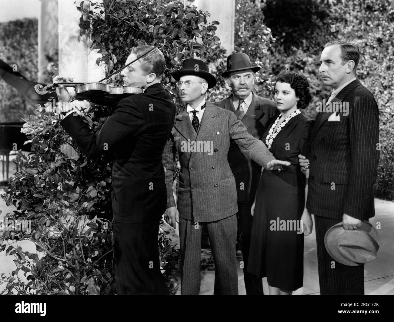 Gene Raymond, Charles Halton, Olympe Bradna, on-set of the Film ...