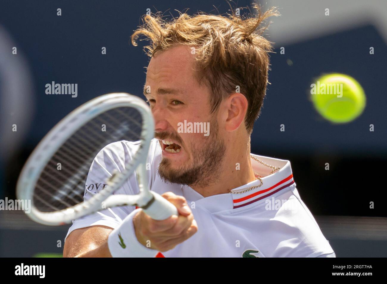 Daniil Medvedev, of Russia, hits a return to Alex de Minaur, of ...