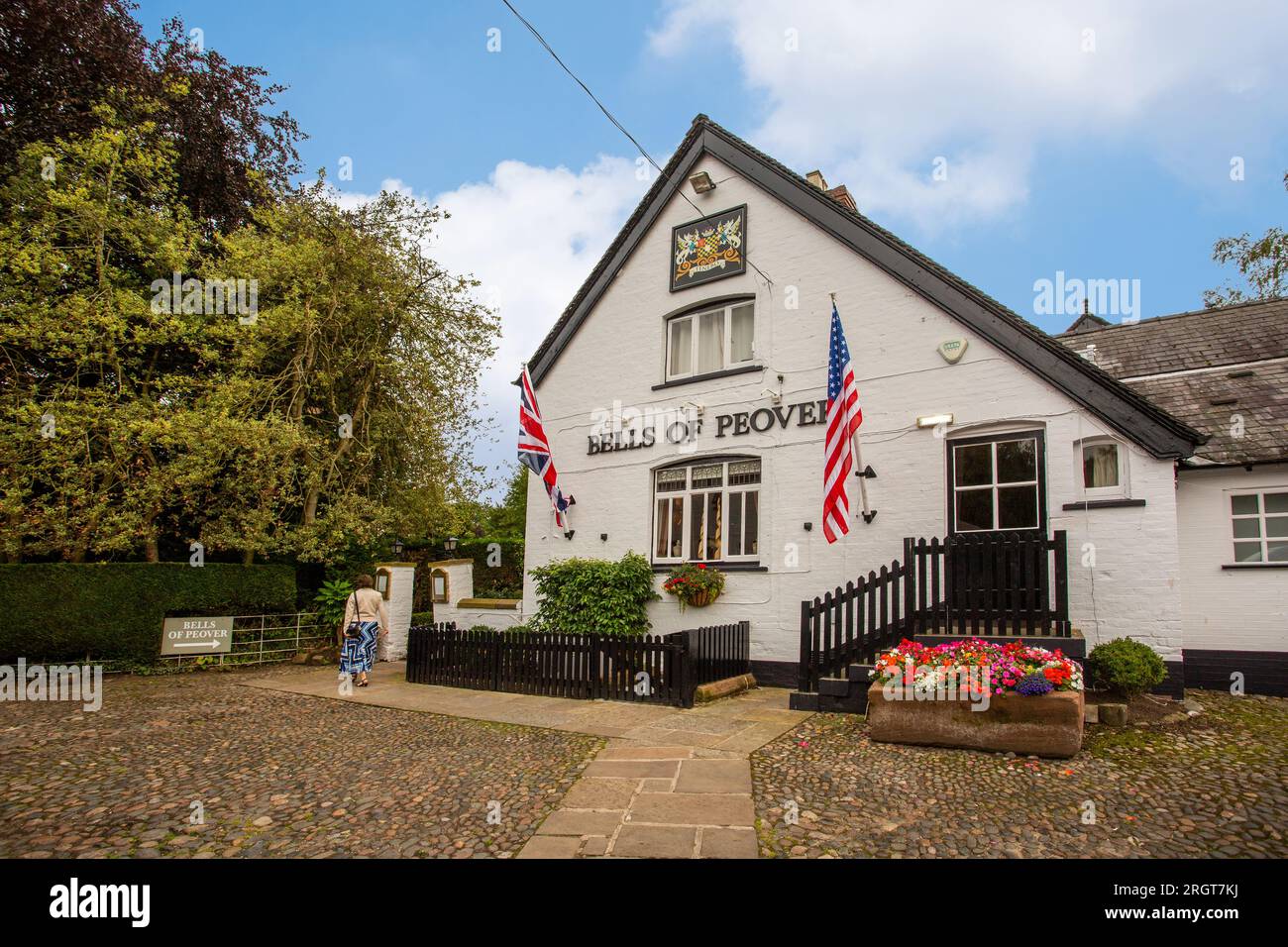 The Bells of Peover public house standing on the cobbled village square ...