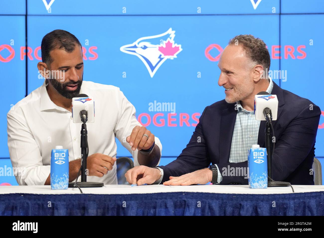 Toronto, Can. 11th Aug, 2023. Former Toronto Blue Jays player Jose Bautista is handed a one day ...