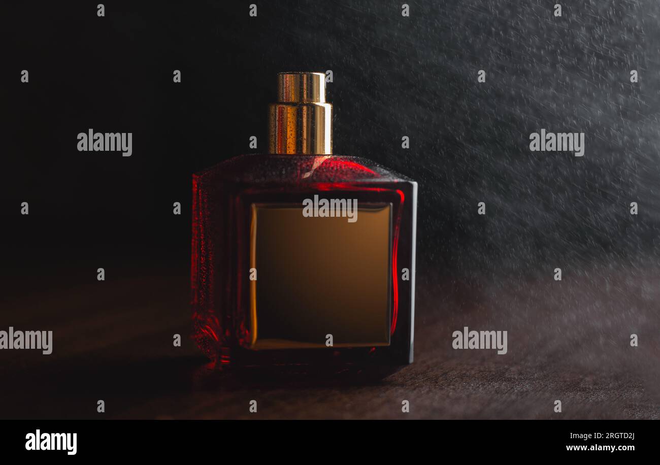 female wet perfume on grey table Stock Photo - Alamy
