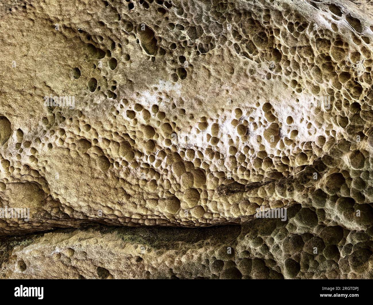 Chipped old rock background texture Stock Photo - Alamy