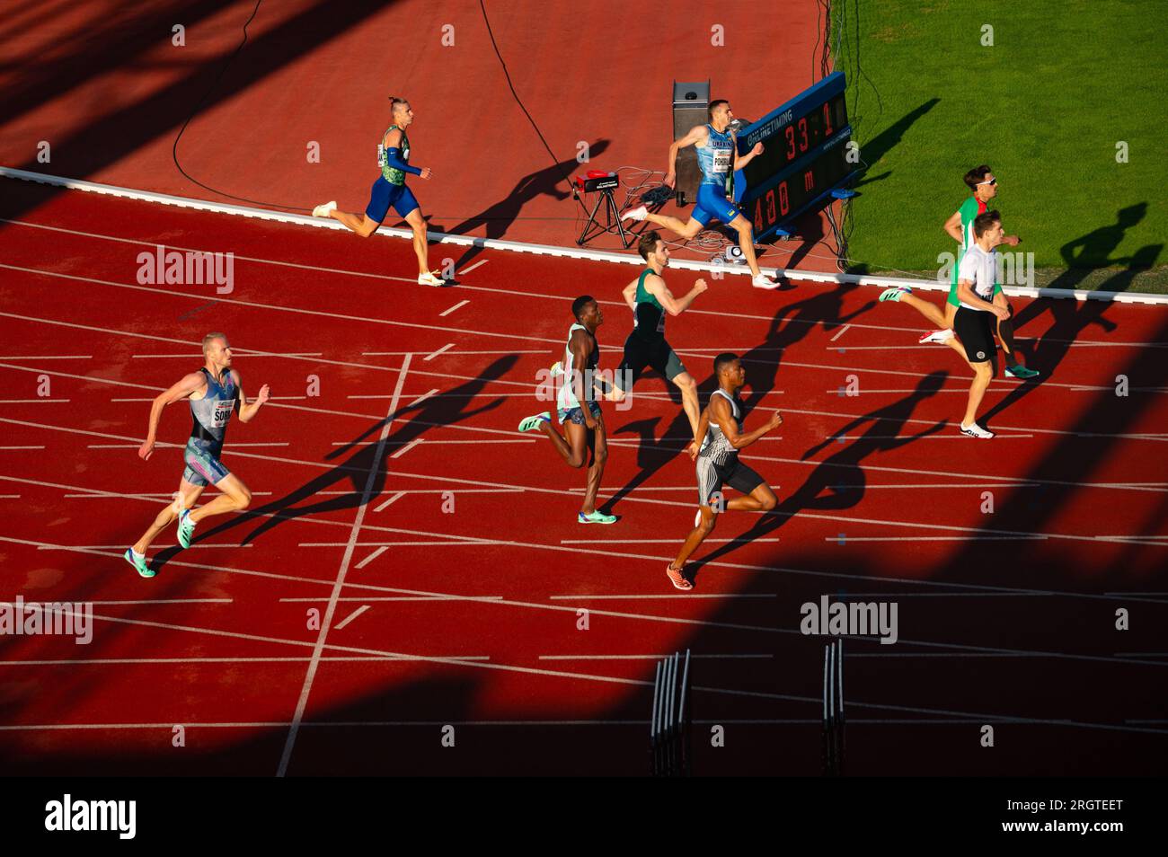 OSTRAVA, CZECHIA, JUNE 27, 2023: 400m Male Race Curve with Interplay of Light and Shadow in ...
