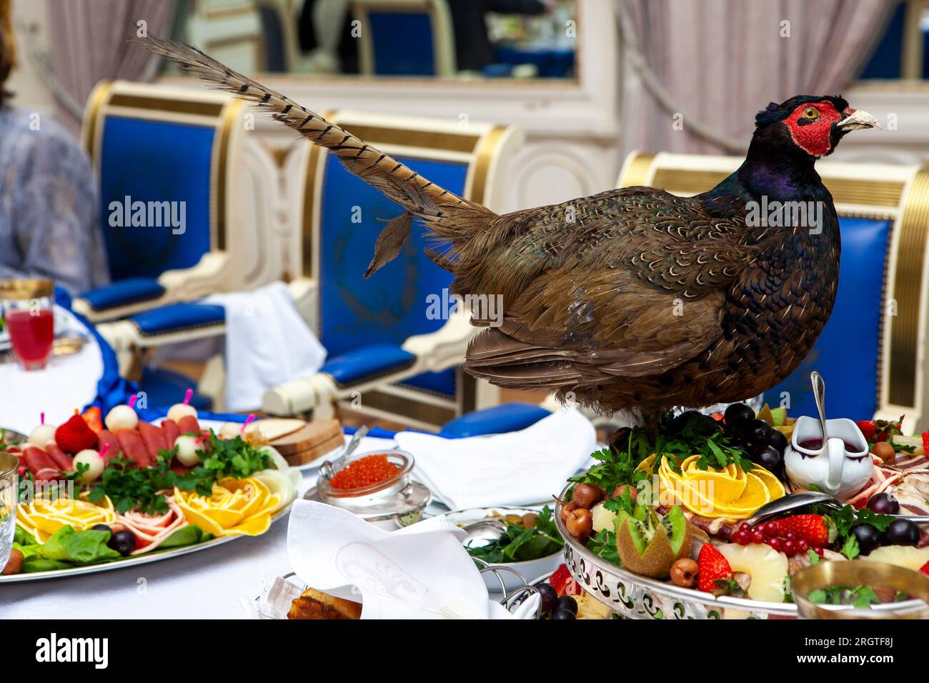 Russian-style table, dishes with caviar, cold cuts, fruits, vegetables ...