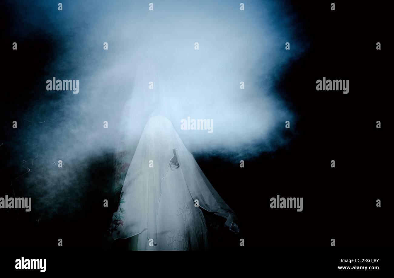scary ghost in foggy night Halloween background Stock Photo - Alamy