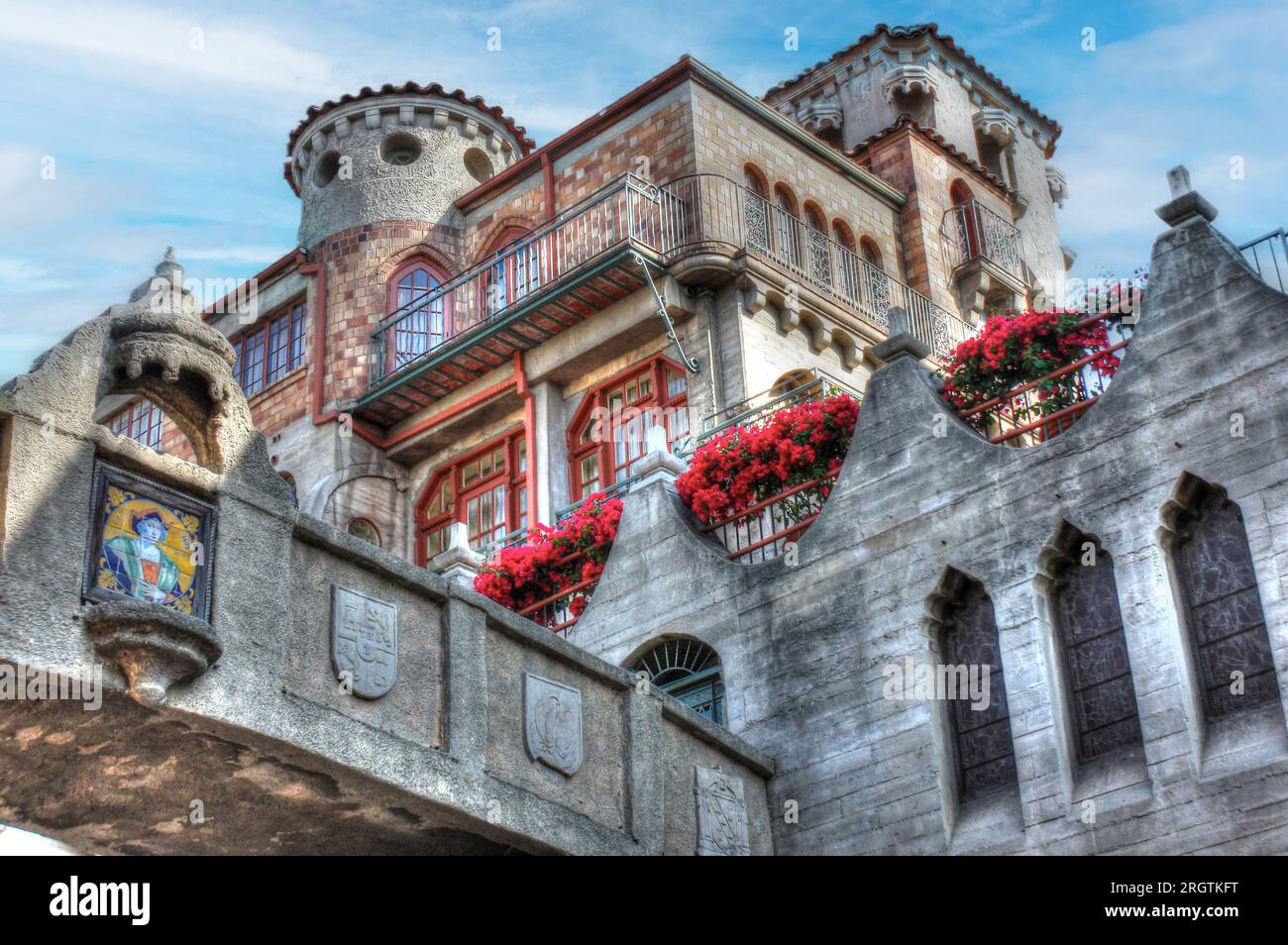 Low angle view of balconies and bridge of the famous Mission Inn hotel ...