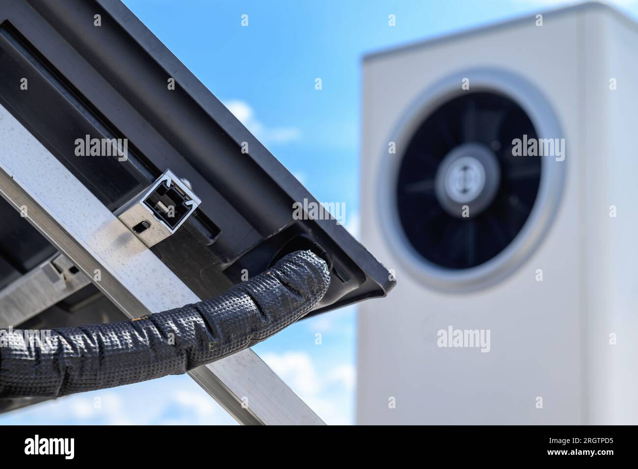 Heat pump and solar collector on the roof Stock Photo - Alamy