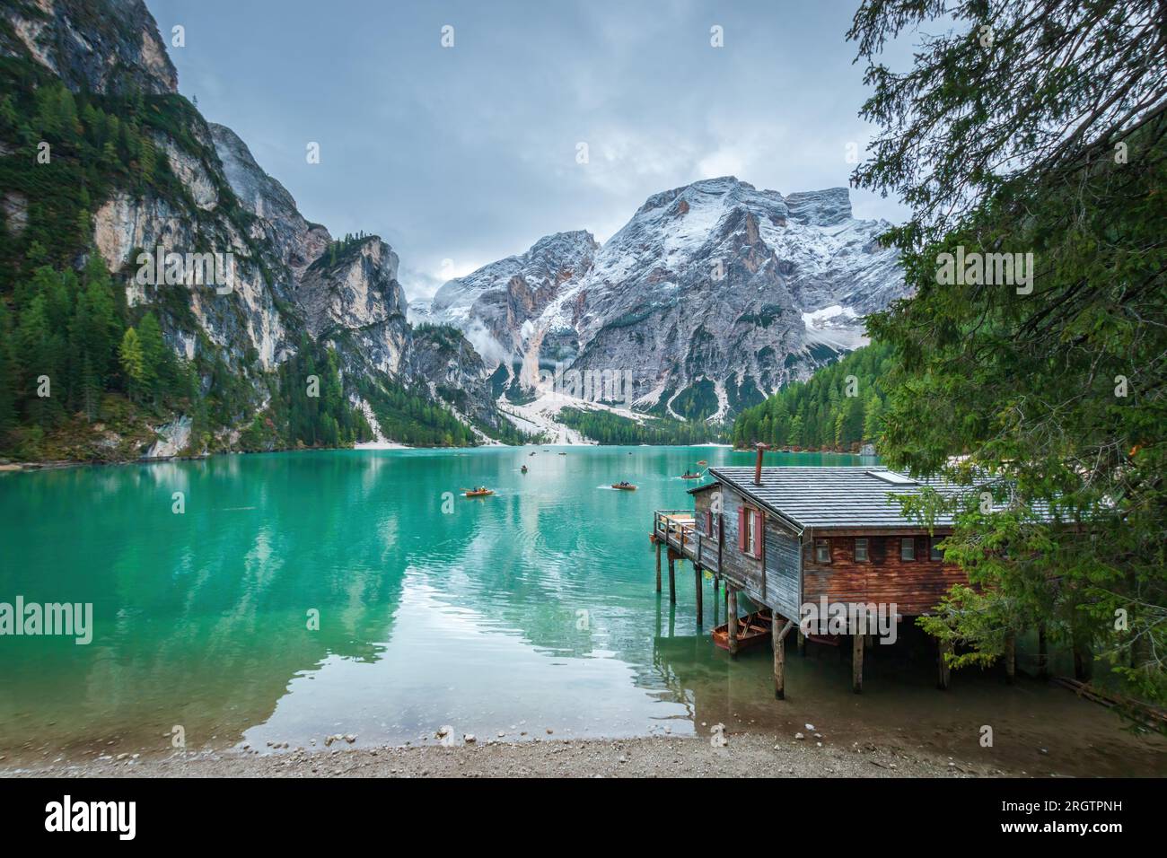 Scenic view of Lake Braies (germ. Pragser Wildsee, ital. Lago di Braies) boathouse in Italy ...