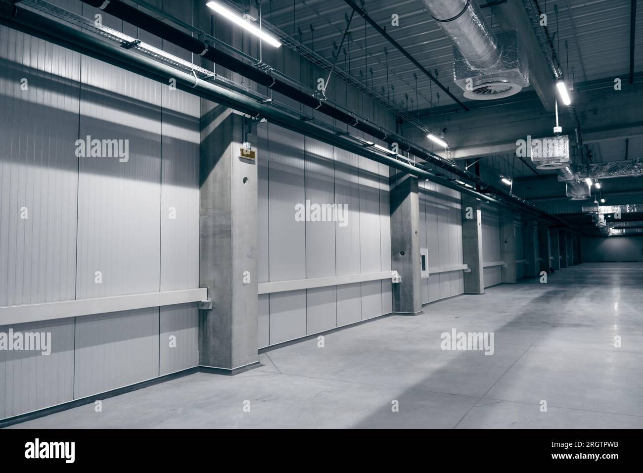 Empty industrial hall with ceiling ventilation system Stock Photo - Alamy