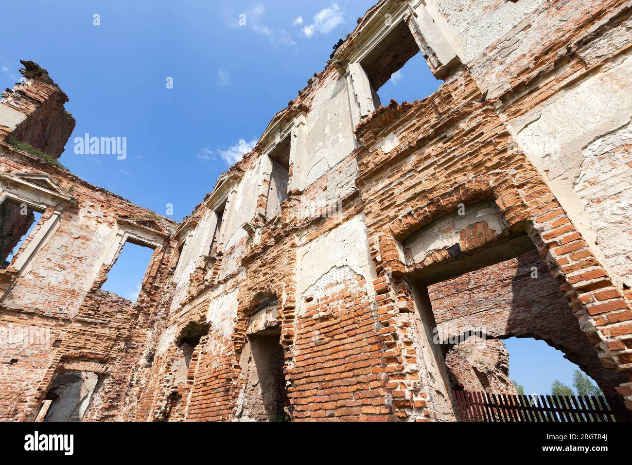 abandoned ruins of an ancient fortress made of red brick, the castle ...