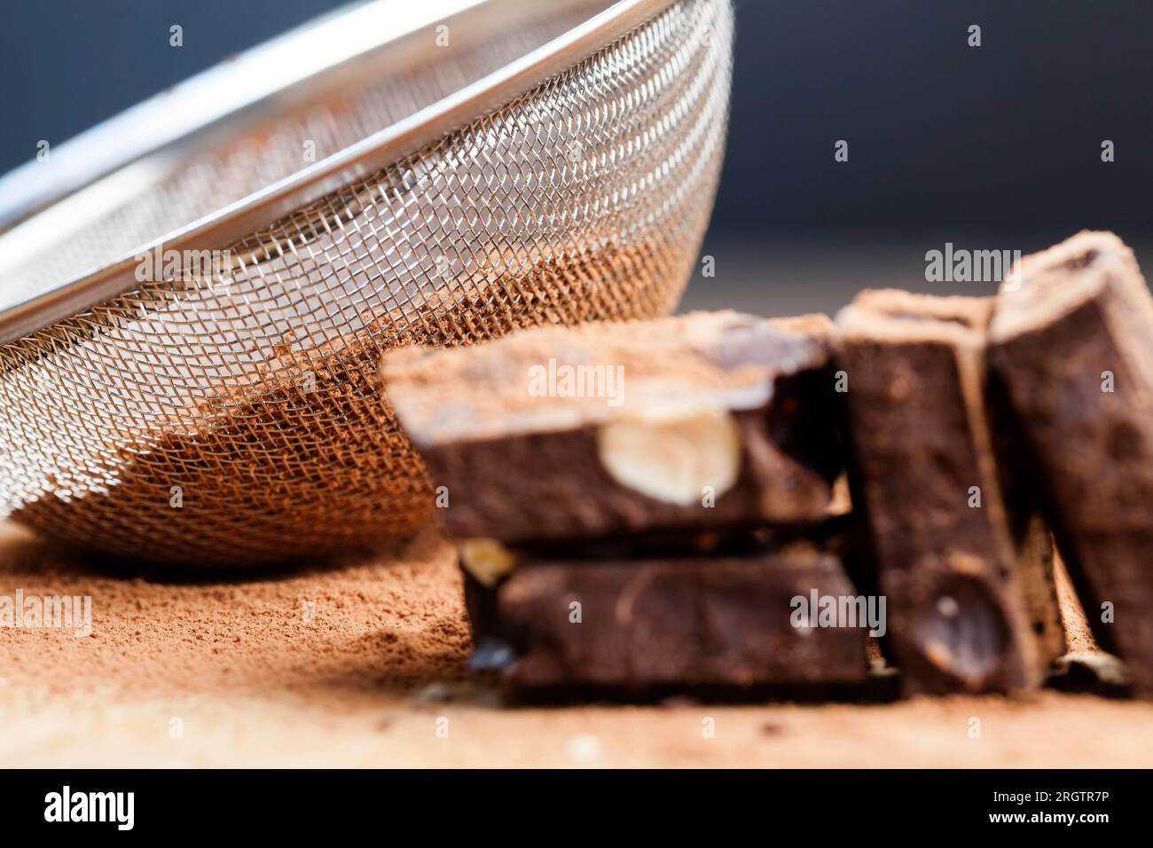 sweet chocolate with nuts broken into pieces, pieces of chocolate with ...