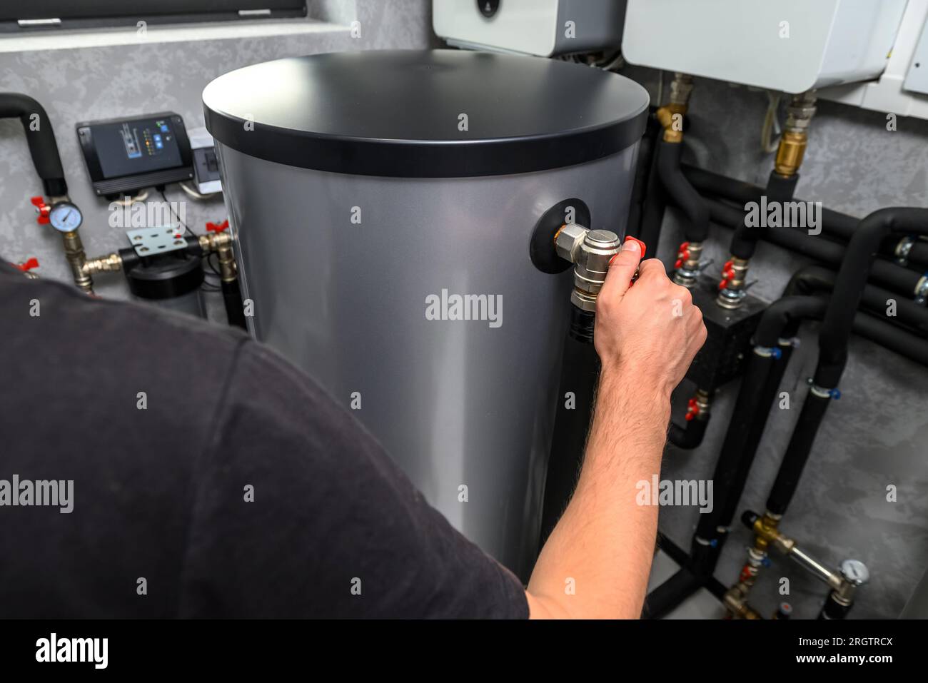 Modern electric boiler room in the house Stock Photo - Alamy