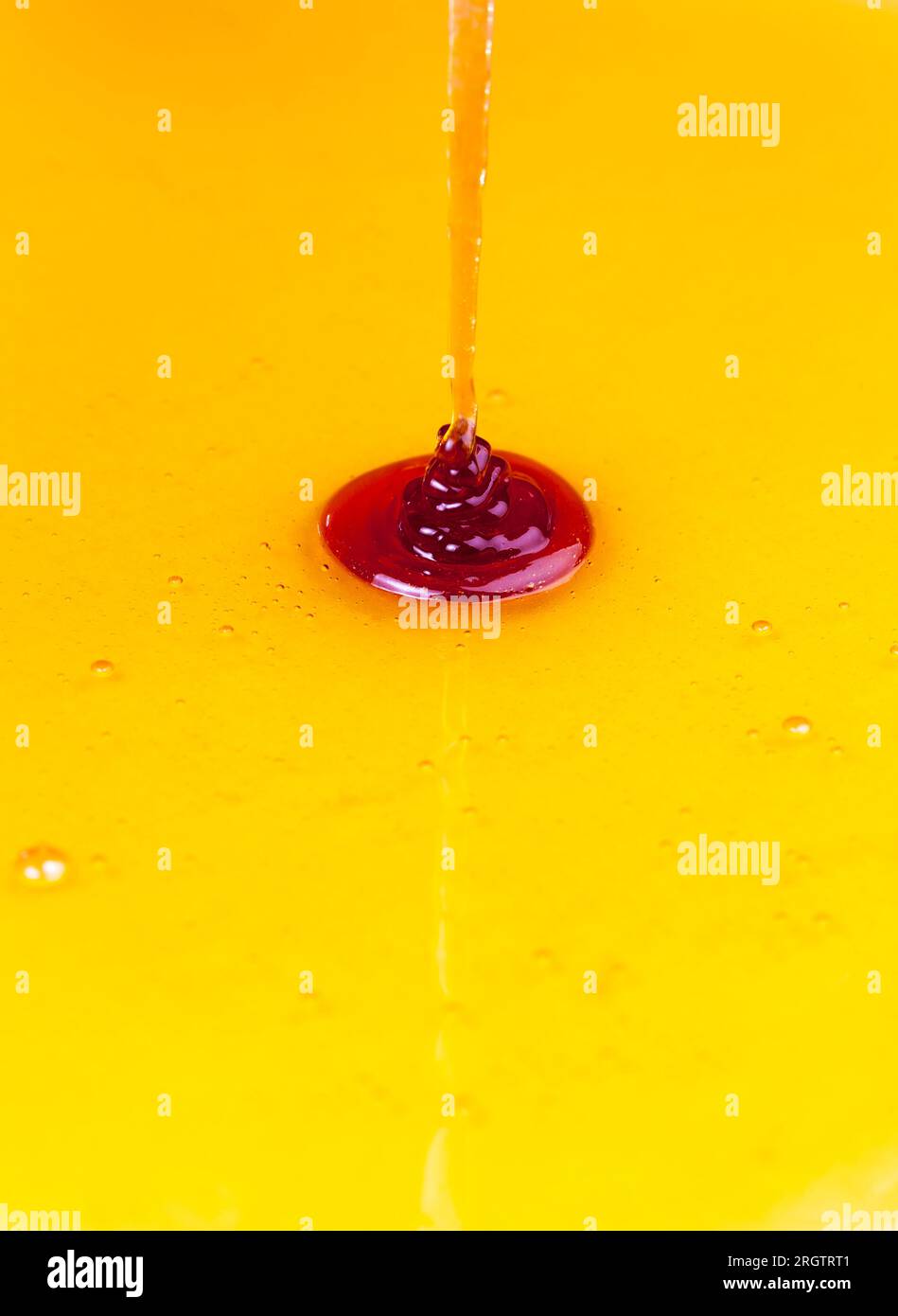 thick and sweet honey mixed from different types of honey of different ...
