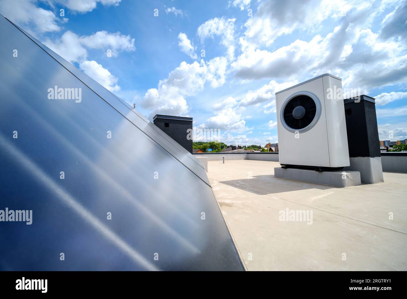 Heat pump and solar collector on the roof Stock Photo - Alamy