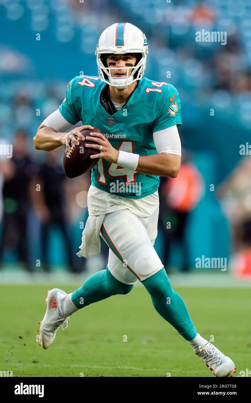 Miami Dolphins quarterback Mike White looks for an open receiver during ...