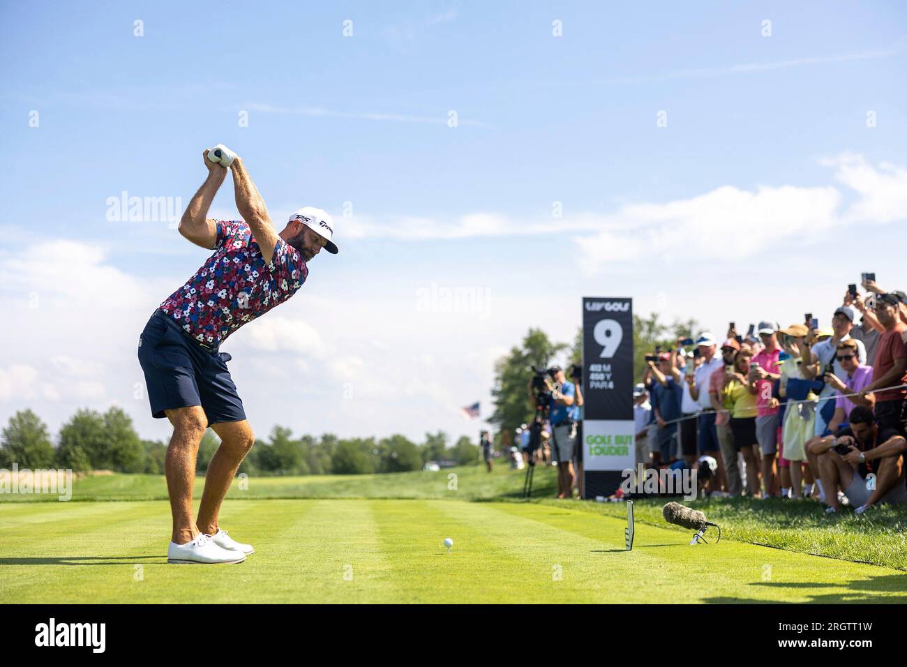 Captain Dustin Johnson of 4Aces GC hits his shot from the ninth tee ...