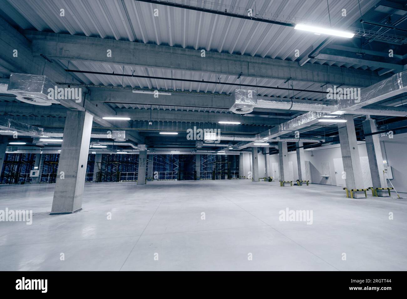 Empty industrial hall with ceiling ventilation system Stock Photo - Alamy