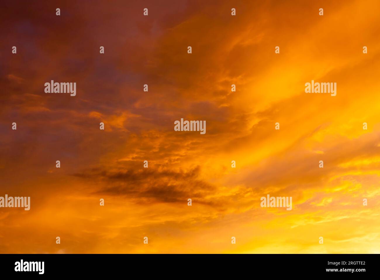 colorful yellow orange and other colors of the sky with clouds during ...