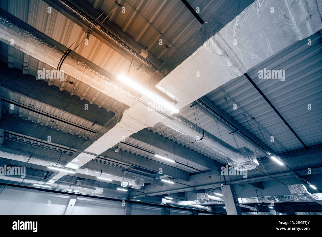 Air ventilation system on the ceiling in a large warehouse Stock Photo ...