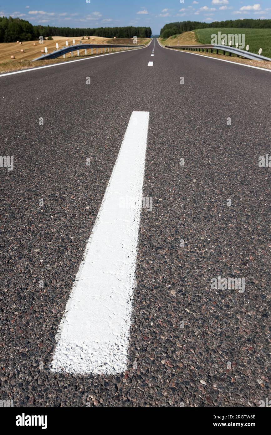 white markings on the road to ensure the safety and regulation of the ...