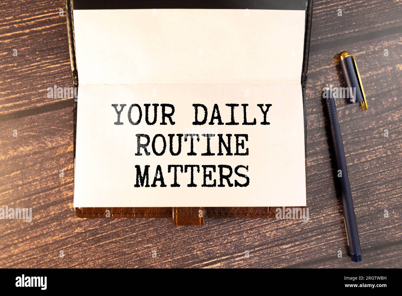 Your Daily Routine Matters. write on a book isolated on office desk ...