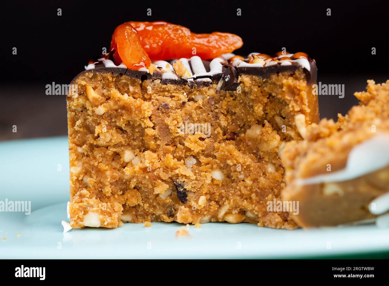 sweet cake in the shape of a cylinder, made of peanuts, sugar and dairy ...