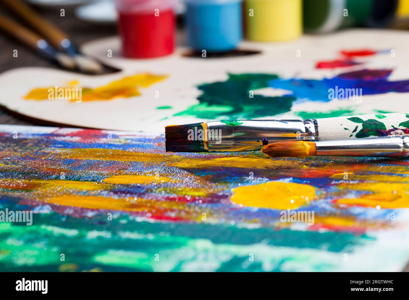 a person's creative process of drawing by mixing different colors of ...