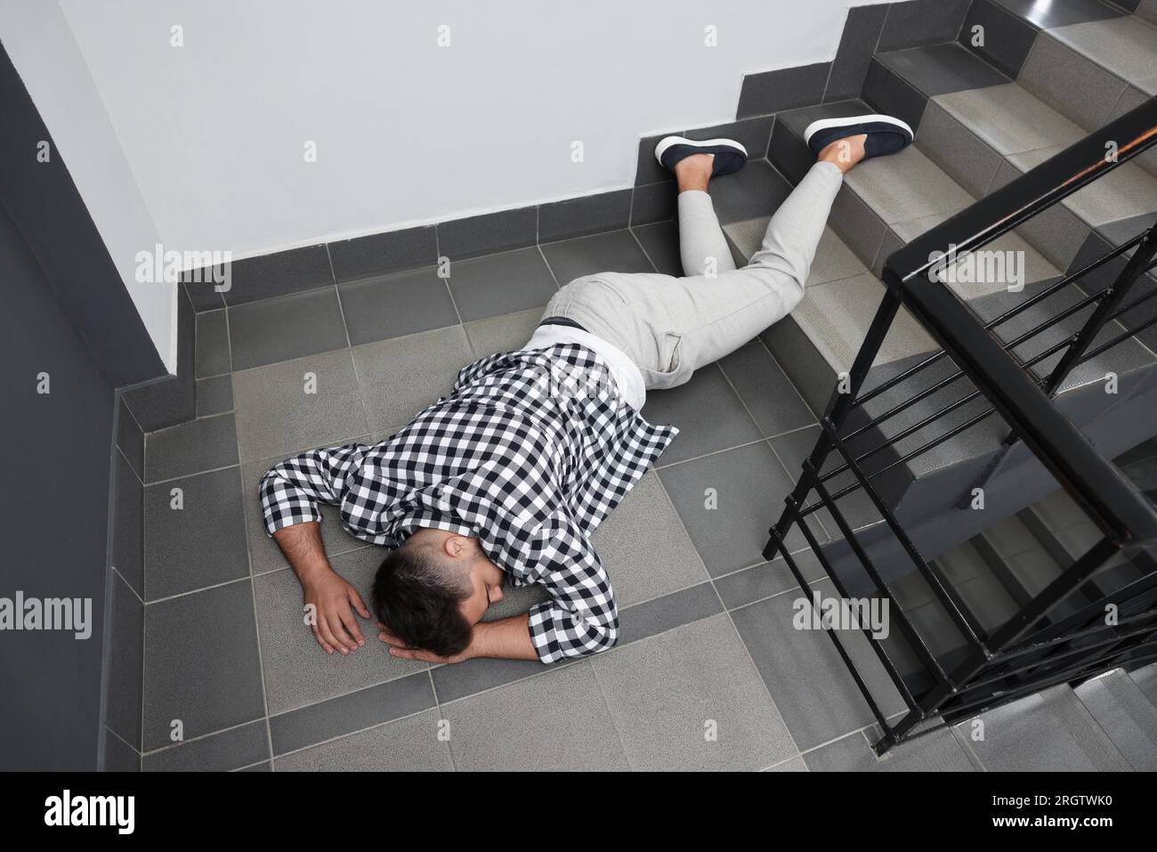 Unconscious lying on floor hi-res stock photography and images - Alamy