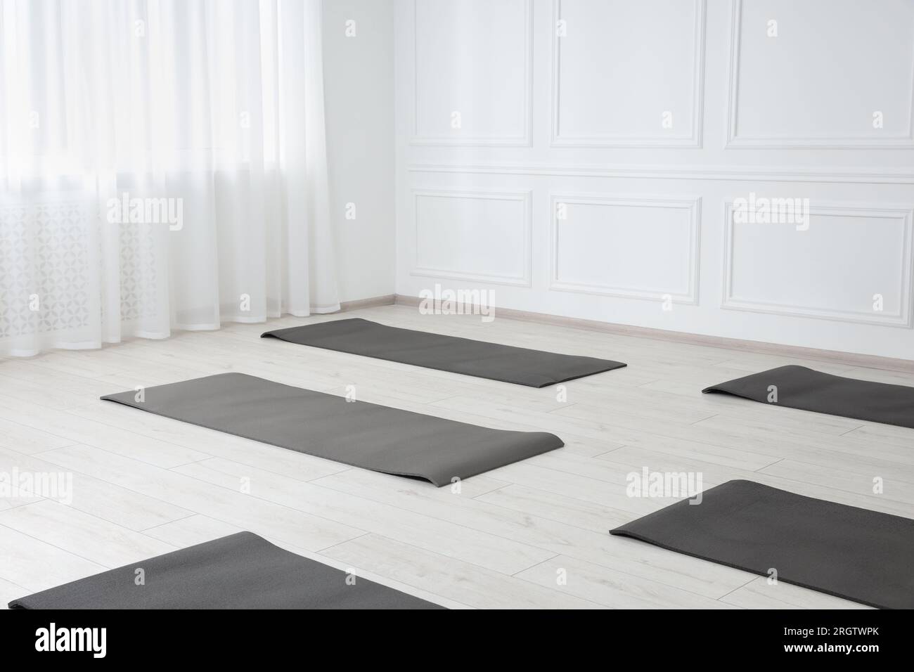 Empty yoga studio mats hi-res stock photography and images - Alamy