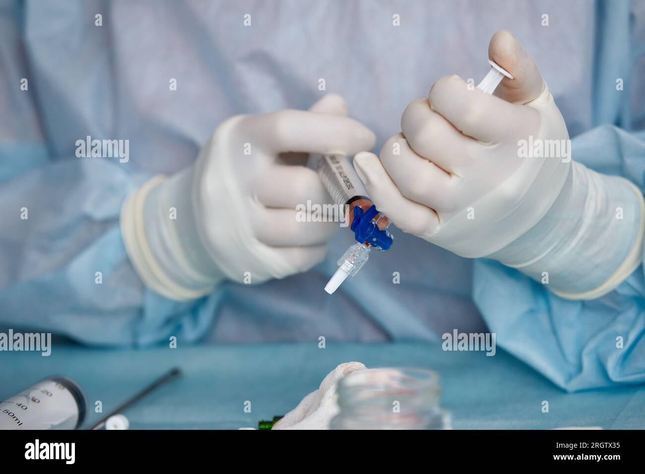 Perspective of a patient on a operating table who sees the doctor above ...