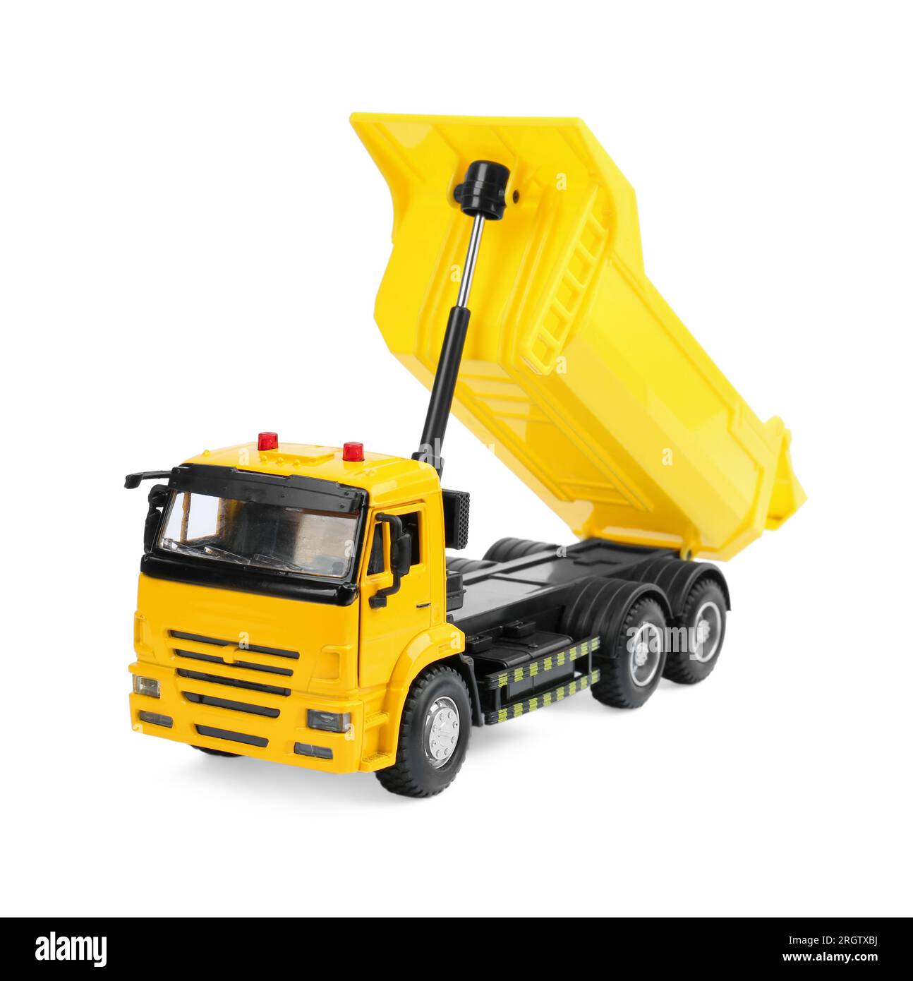 Yellow truck isolated on white. Children's toy Stock Photo - Alamy