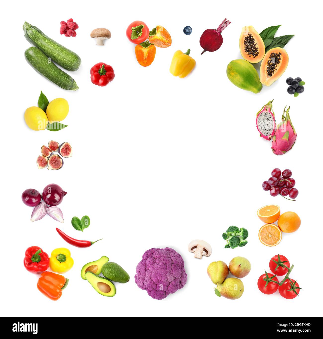 Frame of different fresh fruits and vegetables on white background, top ...