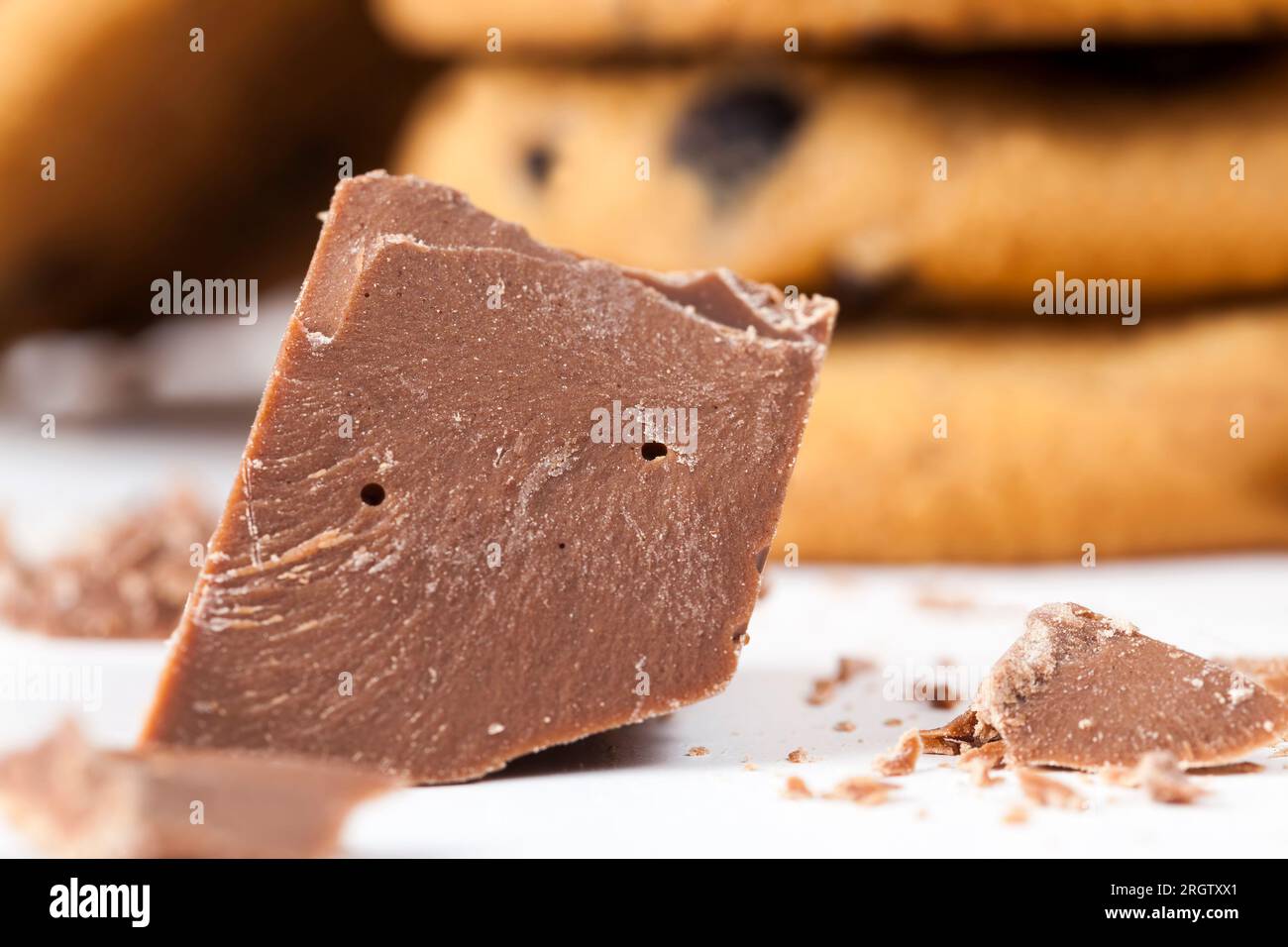 pieces of sweet chocolate together with cookies with pieces of ...