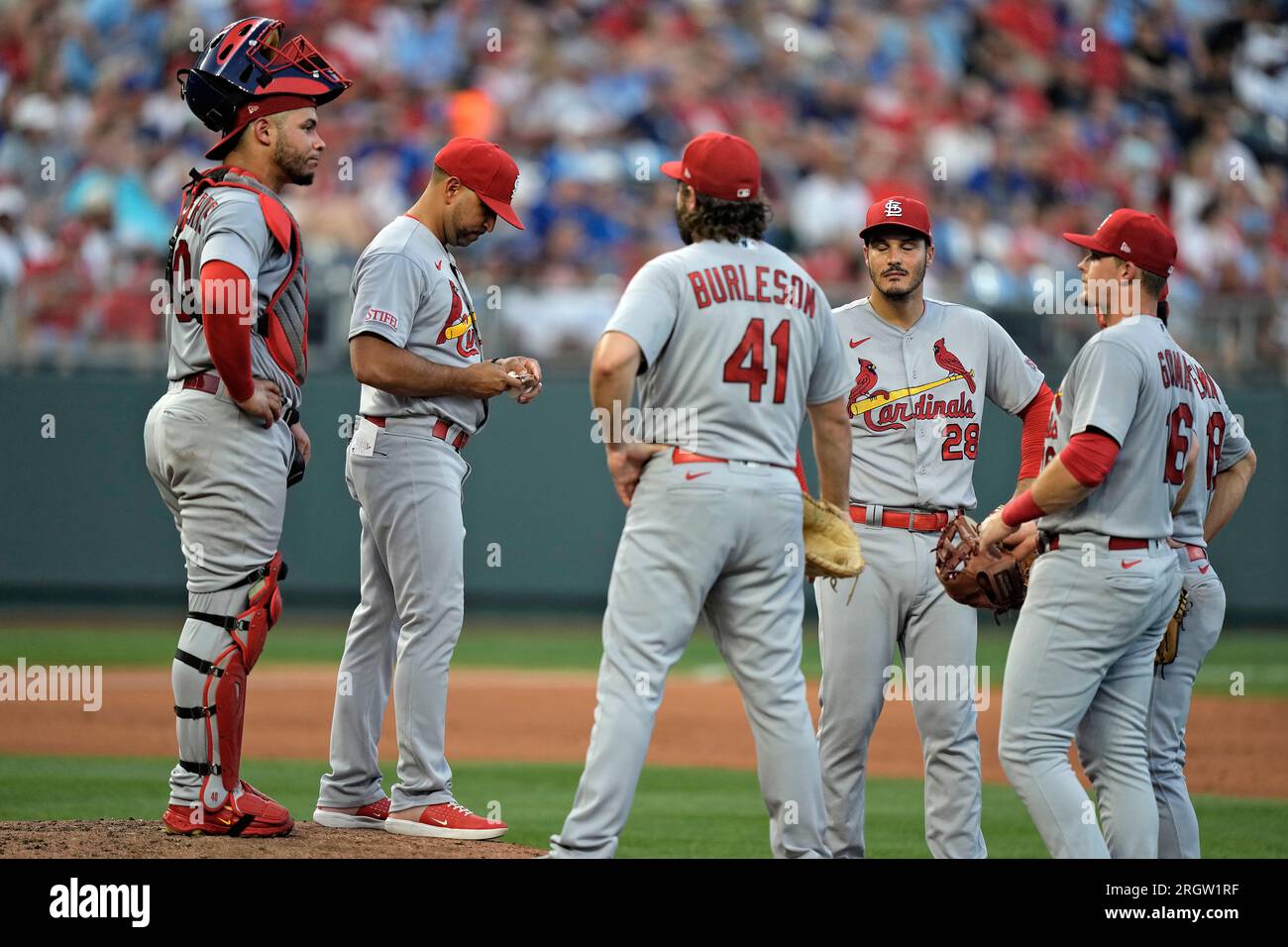 St. Louis Cardinals manager Oliver Marmol, second from left, waits on ...