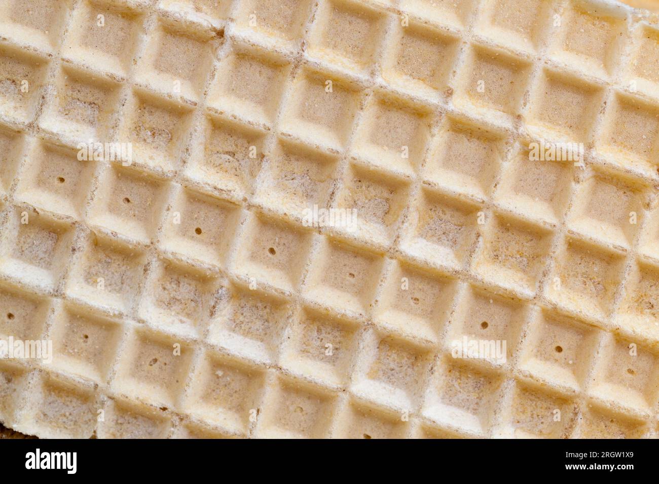 wheat waffles with a square pattern, fresh crispy waffles stacked ...