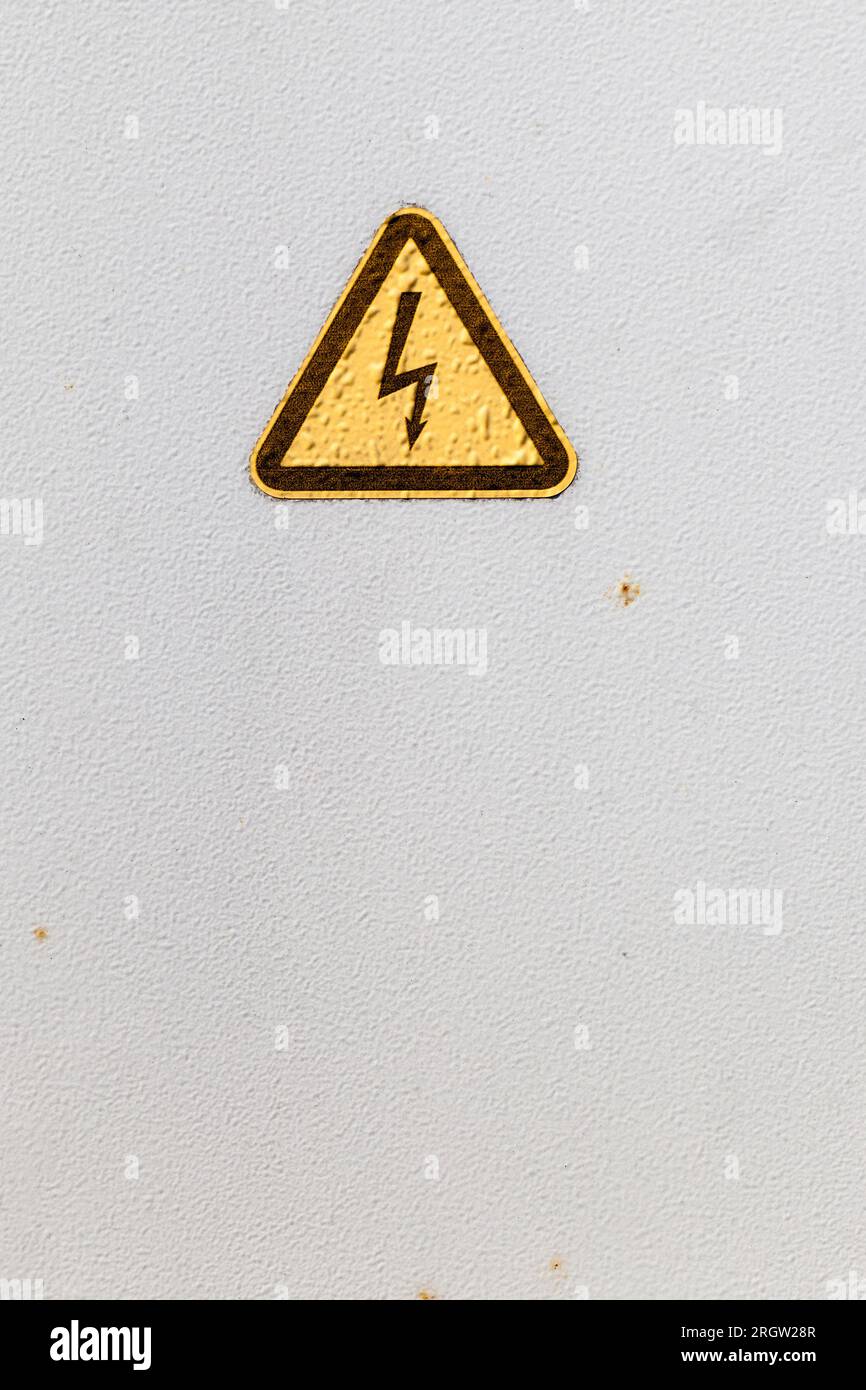 a sign on a metal box about a warning about the danger from electricity ...