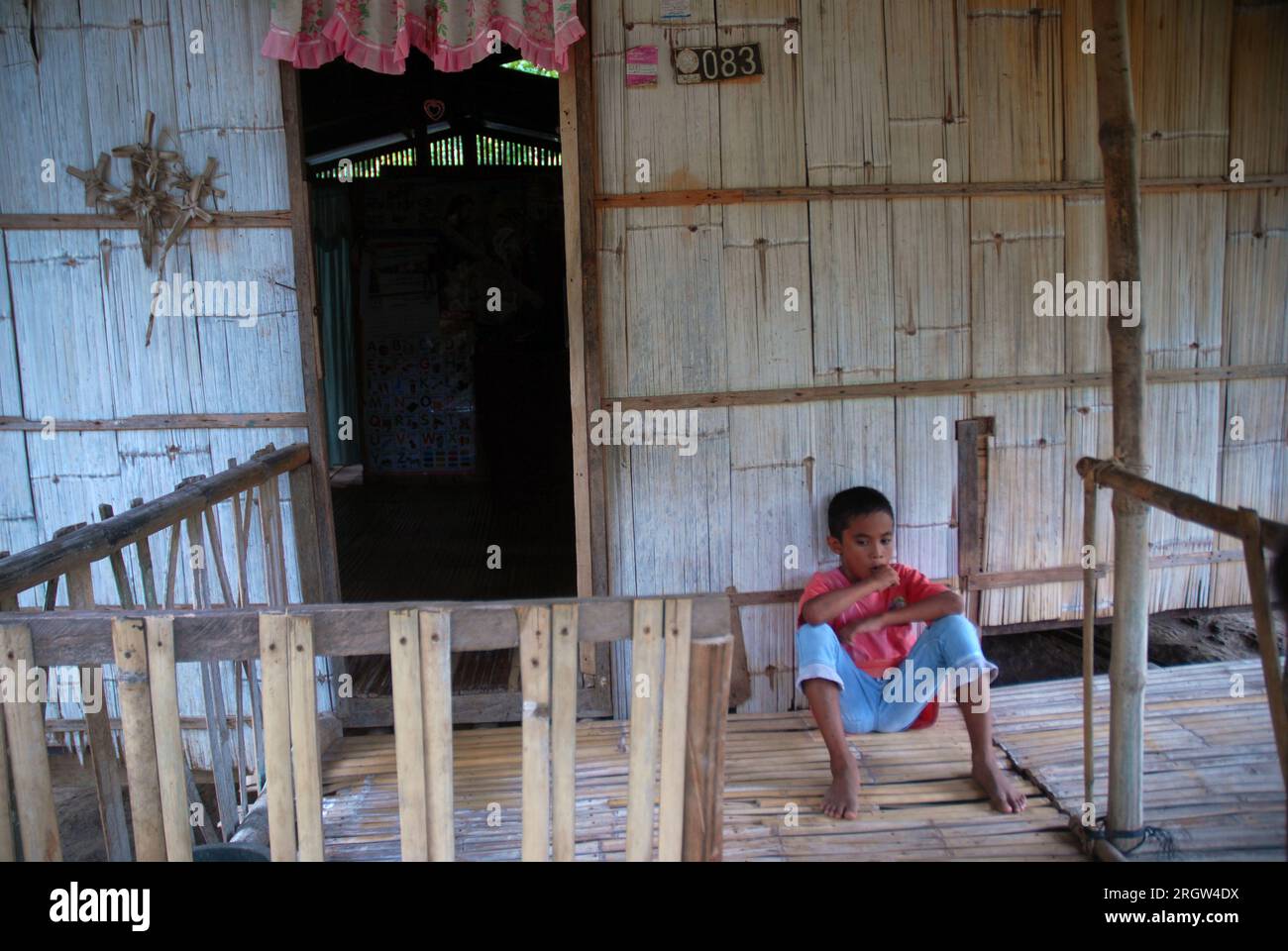 Children outside their home, Kannan, Samal, Davao del Norte ...