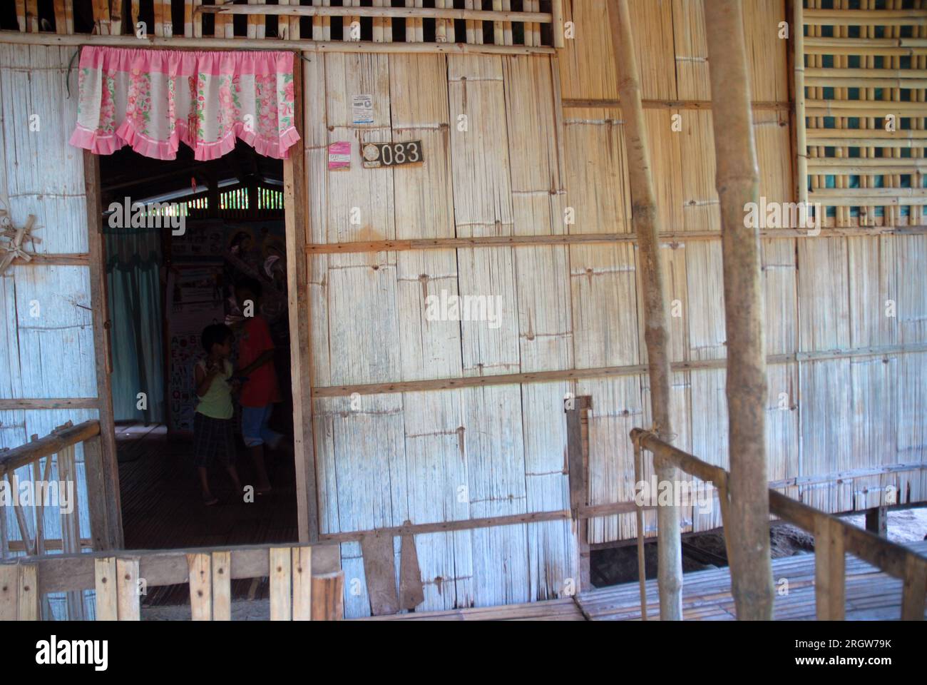 Children outside their home, Kannan, Samal, Davao del Norte ...