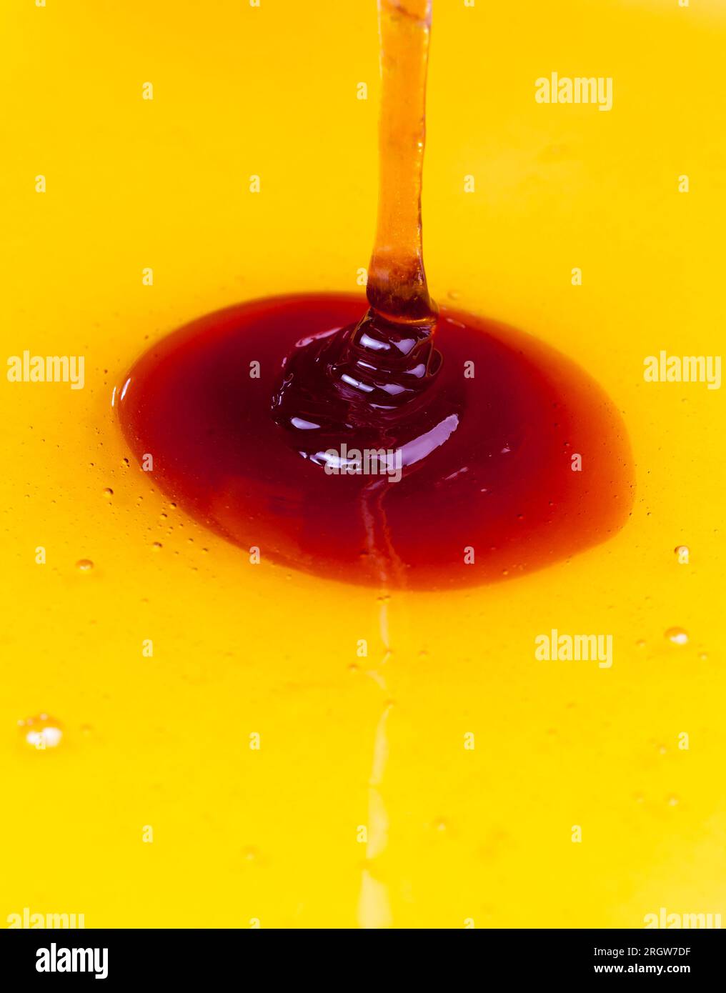 beautiful background of thick and sweet honey with air bubbles, close ...