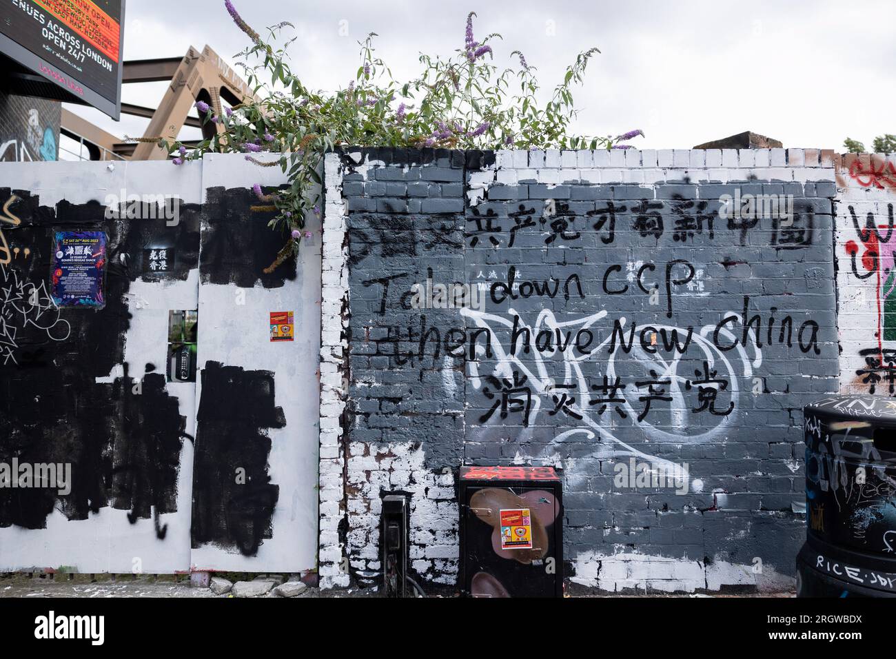 Anti-Chinese government slogans are seen on the wall repainted by the ...