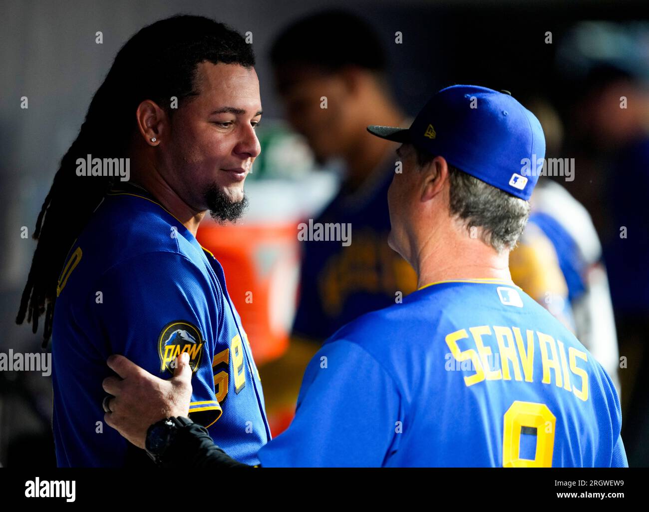 Seattle Mariners starting pitcher Luis Castillo talks with manager ...