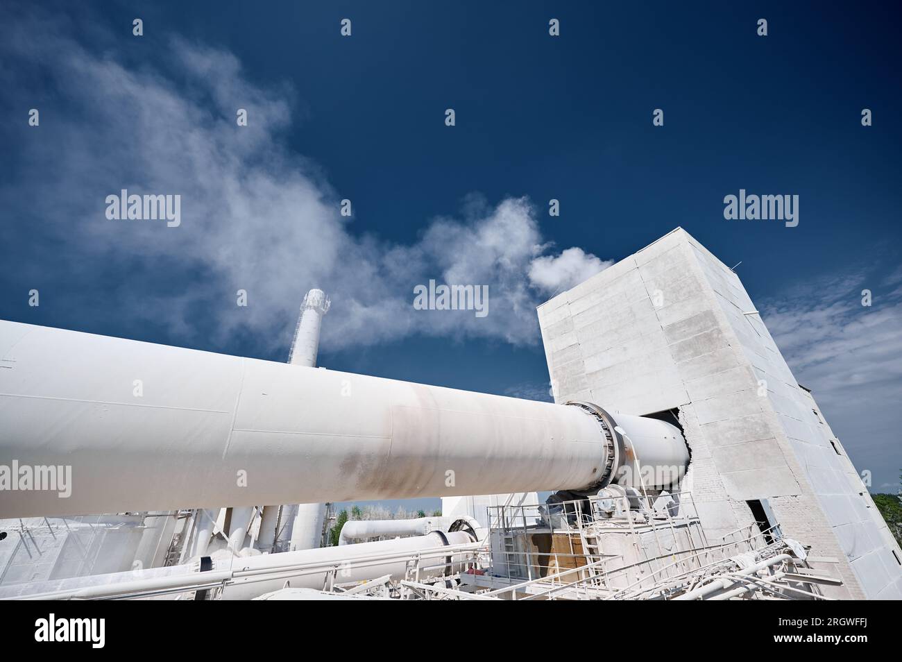 Building of loading device of roasting rotary furnace Stock Photo - Alamy