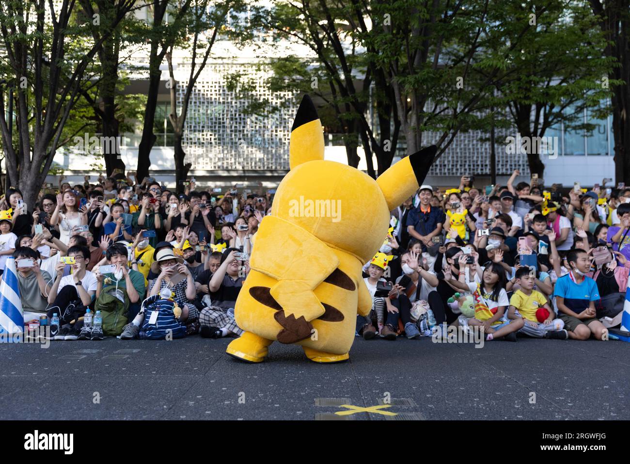 Yokohama, Japan. 11th Aug, 2023. Pikachus interacts with children and ...