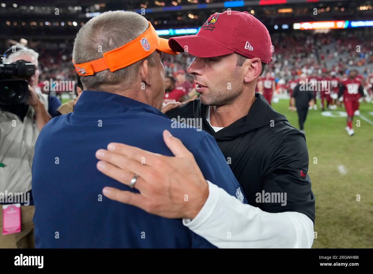 Denver Broncos head coach Sean Payton, left, hugs Arizona Cardinals ... Denver Broncos head coach Sean Payton, left, hugs Arizona Cardinals ...